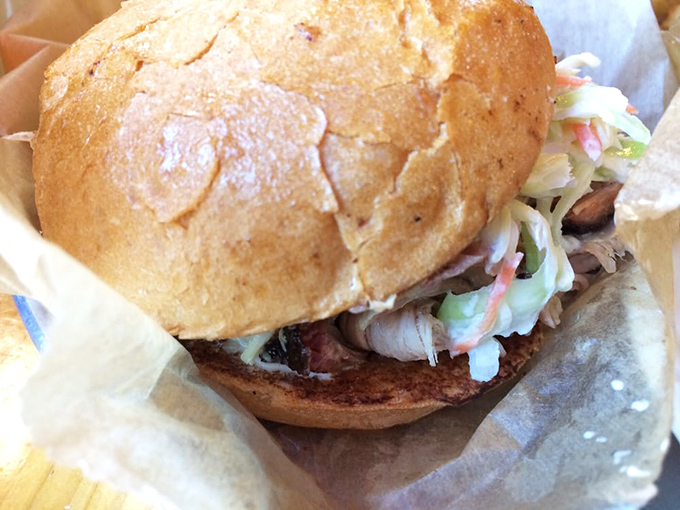 This sandwich isn't just assembled, it's architected&mdash;a masterpiece of smoked meat, creamy slaw, and a bun that's somehow both sturdy and yielding.