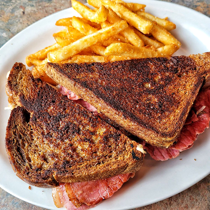 A sandwich that means business &ndash; perfectly toasted bread embracing a generous portion of prime rib. Paired with golden fries, it's lunchtime elevated.