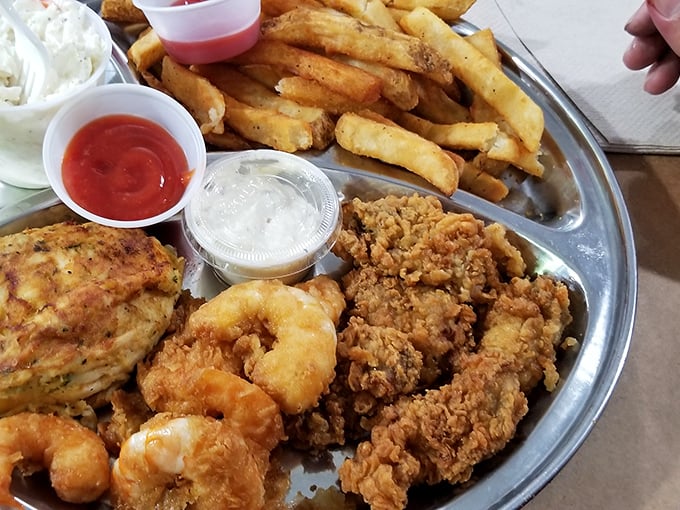 A seafood platter that makes decision-making obsolete. Why choose between fried shrimp, oysters, and fish when you can have the whole aquatic ensemble?