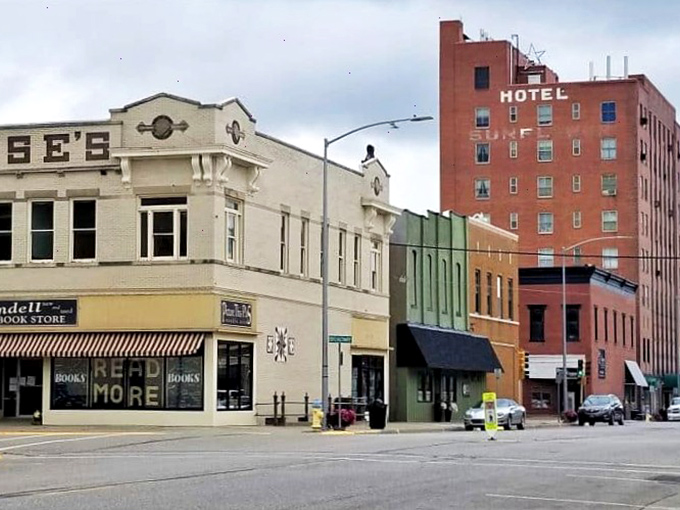 The historic Sunflower Hotel towers over downtown shops like a brick sentinel. Before Airbnb, this was where weary travelers rested after arriving by train, not GPS.