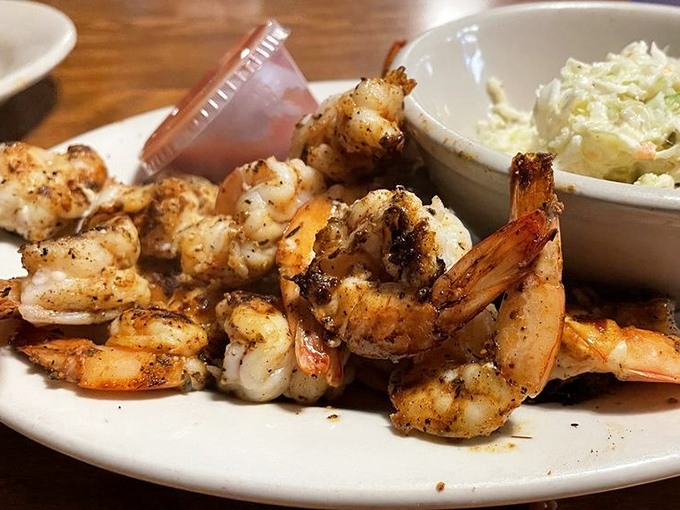 Blackened shrimp that look like they jumped from the boat to the grill to your plate. The char marks tell you everything you need to know.