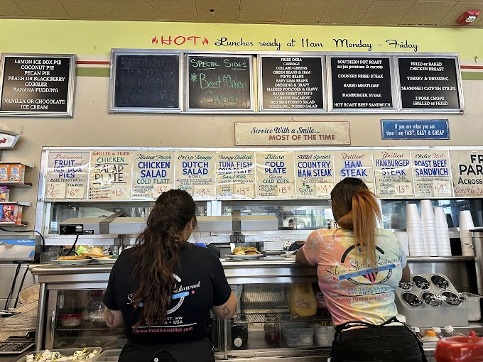 The counter staff moves with the practiced efficiency that comes only from years of experience, like watching a perfectly choreographed breakfast ballet.
