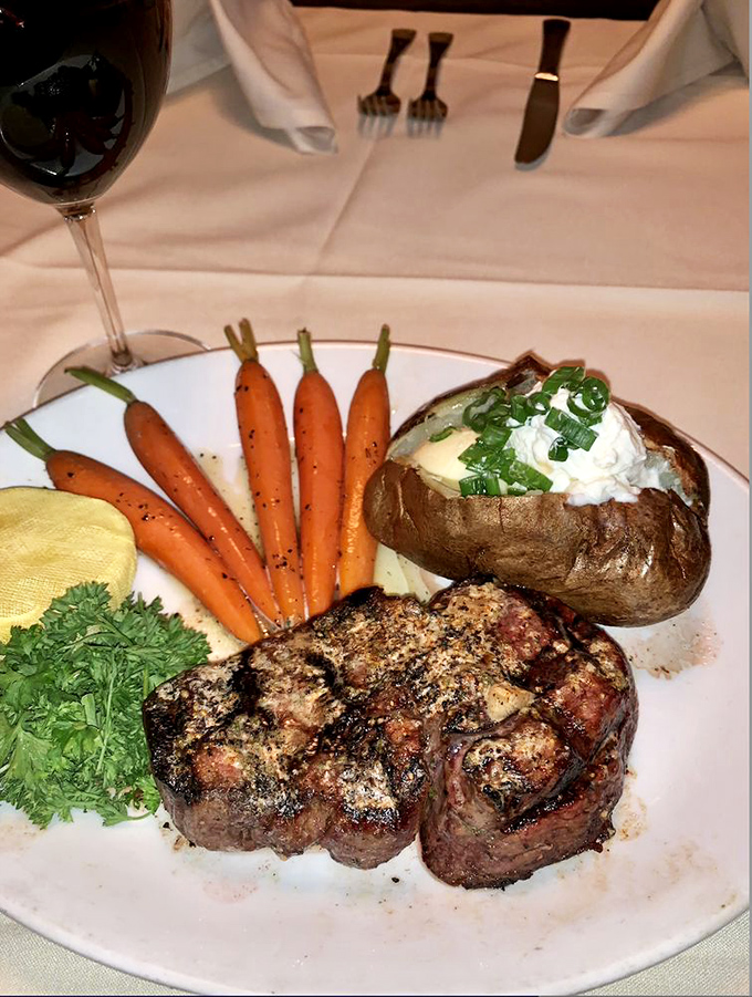 Even landlubbers find happiness here. This perfectly charred steak and loaded baked potato prove The Salt Cellar isn't just a one-trick pony.