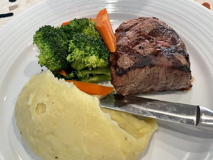 Even landlubbers get the royal treatment with this perfectly seared steak, proving Georgie's isn't just a one-sea pony.