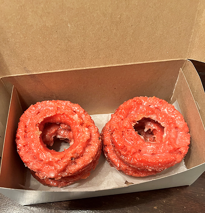 These strawberry cake donuts don't just look pretty in pink &ndash; they're practically begging to be dunked in your coffee.