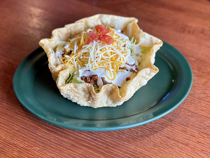This isn't just a chicken dish&mdash;it's a master class in presentation. Sliced chicken breast surrounded by fresh lettuce and diced tomatoes makes healthy look indulgent.