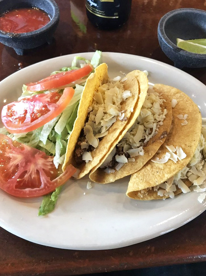 Street tacos done right&mdash;simple, authentic, and topped with just enough cheese to make you contemplate ordering another round immediately.