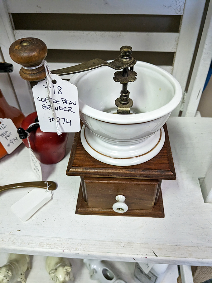 Grinding beans the old-fashioned way. This vintage coffee grinder reminds us that good things come to those who crank.