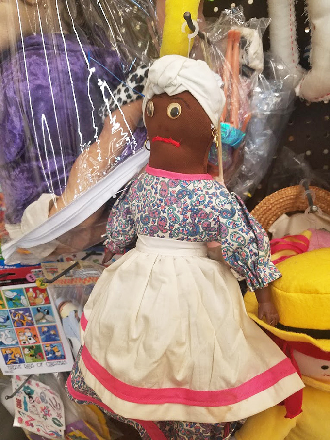 This vintage rag doll has seen things. With that expression, she's either judging your outfit choices or remembering the Carter administration.