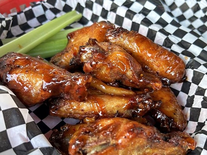This rack of ribs has the kind of mahogany sheen that belongs in a museum of barbecue art. The smoke ring? Pure poetry.