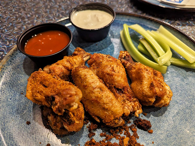 Wings that don't just fly&mdash;they soar. Crispy, seasoned to perfection, with dipping sauces standing by for their supporting role.
