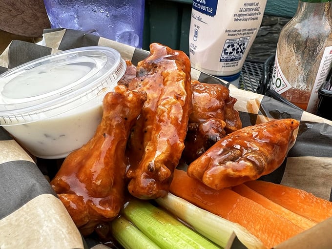 These wings aren't just taking flight&mdash;they're soaring with sauce and accompanied by the kind of dipping experience that requires an extra napkin or three.