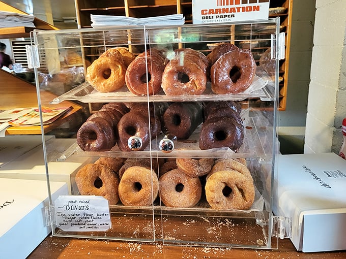 These glazed donuts have the perfect shine-to-chew ratio that food scientists in labs can only dream about. Stacked like golden rings waiting for worthy fingers.