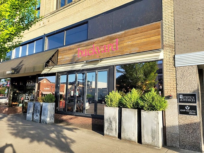  Backyard Pizza's modern-rustic exterior hints at the wood-fired wonders waiting inside this Huntington gem.