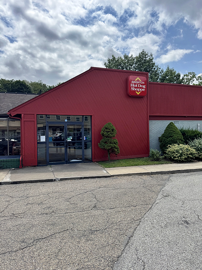 The Brighton Hot Dog Shoppe's barn-red building stands out like a beacon of hope for the hungry Pittsburgh traveler.