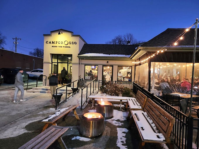 Camporosso's cozy fire pits and string lights create the perfect backdrop for pizza that transports you to Naples.