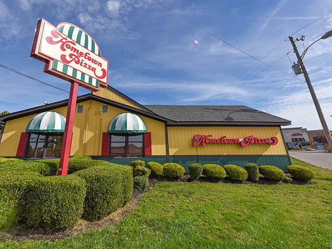 Hometown Pizza: Cheerful yellow with red and green accents &ndash; like Christmas came to town and decided to stay for the pizza.