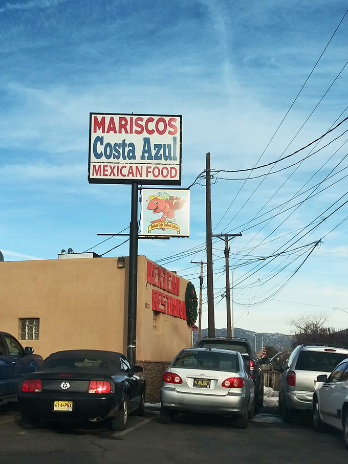 Mariscos Costa Azul's sign promises Mexican seafood in a building that's seen its share of happy, sauce-stained customers.