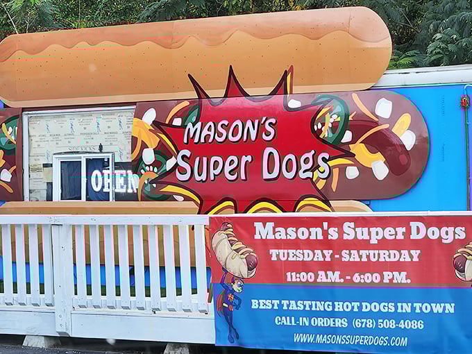 Mason's Super Dogs food trailer bursts with comic book colors and an oversized hot dog topper&mdash;architectural subtlety isn't on this delicious menu.