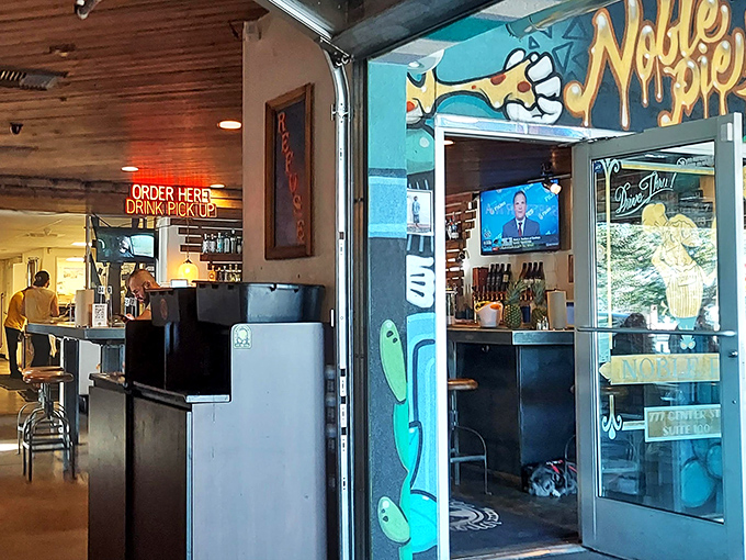  Noble Pie Parlor: Where the entrance looks like a gallery and the pizza tastes like a masterpiece. That "Order Here" sign marks the beginning of your adventure.