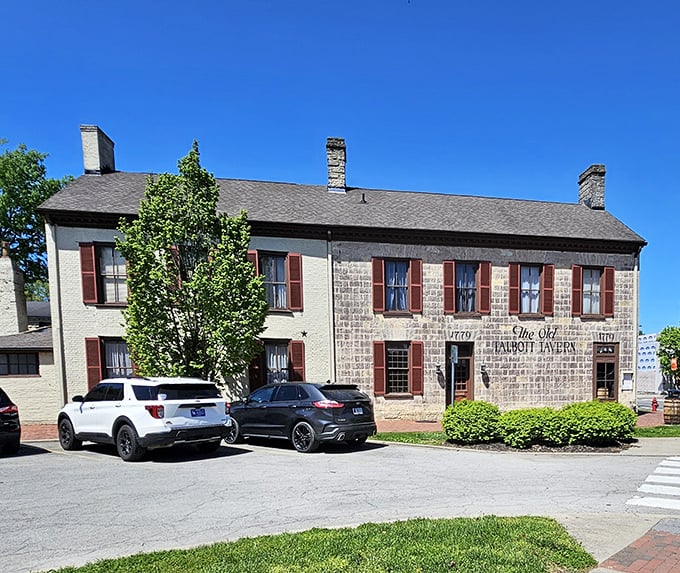Old Talbott Tavern (exterior): "This historic stone building has seen centuries of hungry travelers. If walls could talk, they'd say 'Try the ribeye!'"