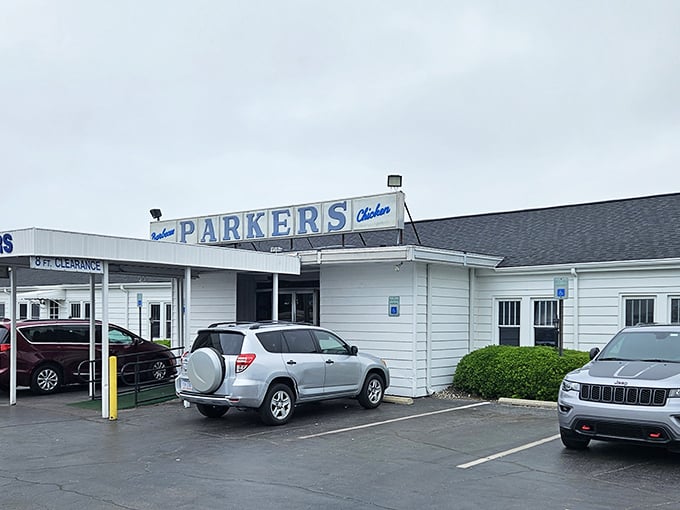 Parker's classic white building and vintage sign have welcomed generations seeking the holy trinity: pork, chicken, and cornsticks.
