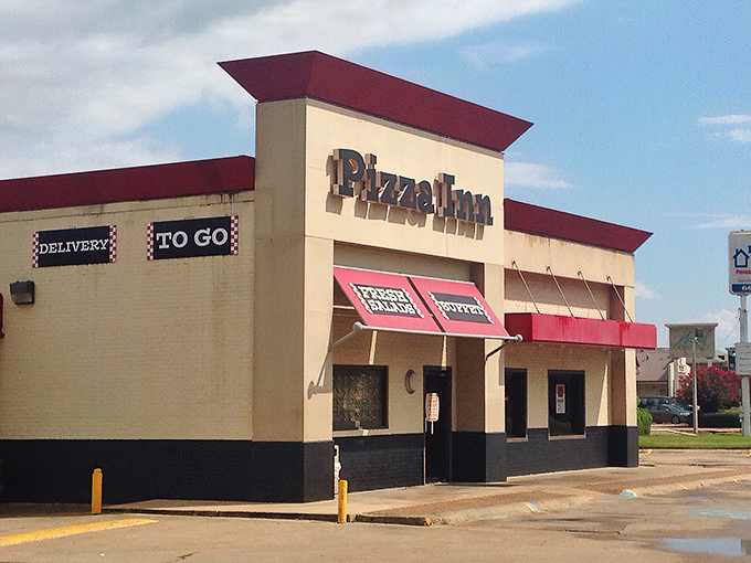 Pizza Inn's straightforward exterior belies the flavor revolution inside. Never judge a pizzeria by its awnings&mdash;life lesson #137.