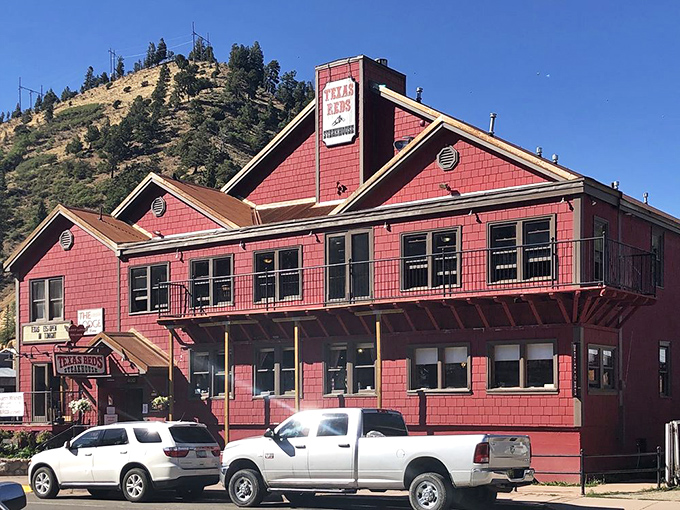 Texas Reds' bold red exterior stands out like a delicious landmark against Red River's mountain backdrop.
