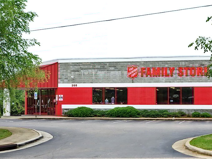 The Salvation Army's bold red exterior serves as a beacon for bargain hunters seeking redemption through retail therapy.