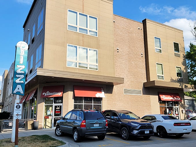 Valentino's (exterior): "The red awning signals pizza royalty in Lincoln. Where students blow their meal money with zero regrets."