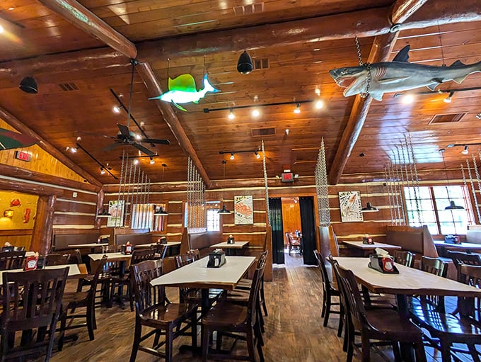 Wooden beams, fishing nets, and mounted catches create the perfect backdrop for seafood feasts at Captain Hook.