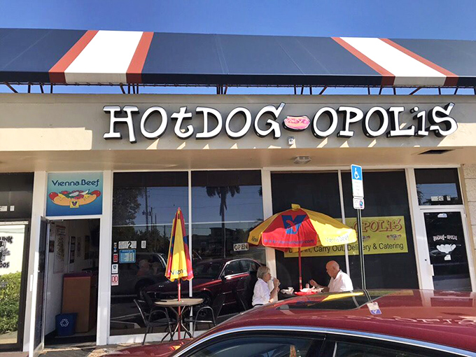 The clean lines and bold signage of Hotdogopolis promise a metropolitan hot dog experience in suburban Boca &ndash; Vienna beef with a side of sunshine.