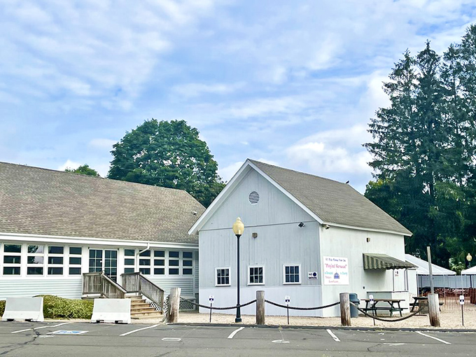 White clapboard and classic New England architecture—Lenny & Joe's looks like it was built by people who prioritize fishing over fashion.
