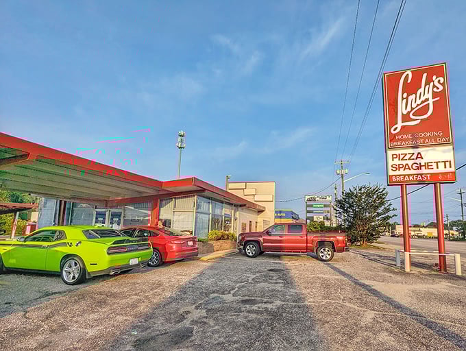 Lindy's Restaurant on a sunny day: Where muscle cars and family sedans share parking spaces, united by the universal language of "I could really go for some spaghetti."