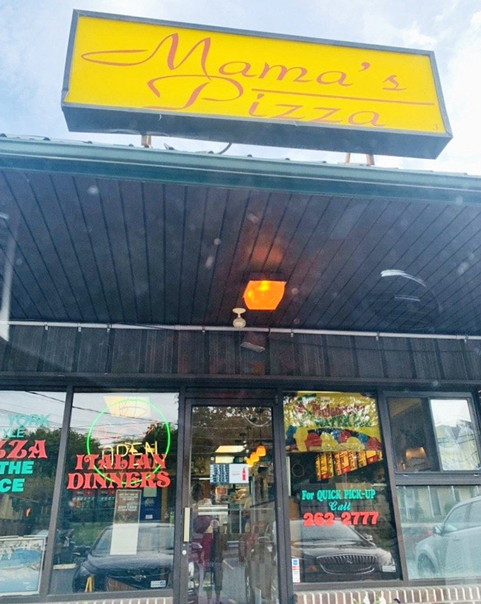 Daytime or nighttime, that Mama's sign promises the kind of pizza that makes family recipes worth fighting over.