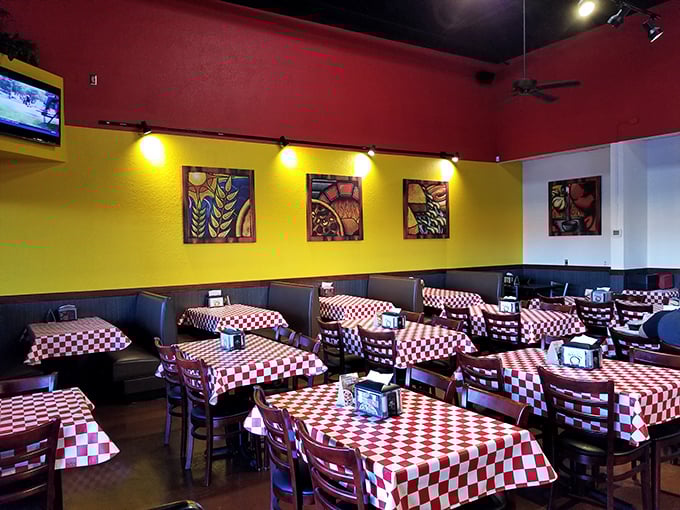 The vibrant interior with its checkered tablecloths feels like stepping into your Italian-American cousin's dining room &ndash; if your cousin made incredible pizza.