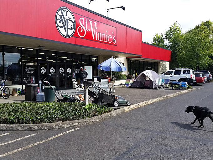 The impromptu furniture display outside suggests what awaits inside: unexpected finds at prices that feel like clerical errors.