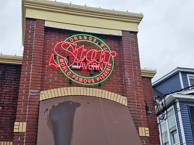 This unassuming brick building houses pizza alchemy that transforms simple ingredients into New Jersey's most celebrated bar pies.