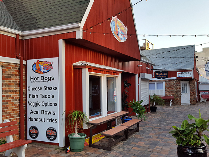 Red barn charm meets coastal casual at Twilley's. The menu board promises everything from classic dogs to a&ccedil;a&iacute; bowls.