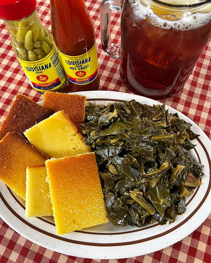 Collard greens and cornbread&mdash;a combination so perfect it should have its own holiday. Louisiana hot sauce standing by for those who need an extra kick.