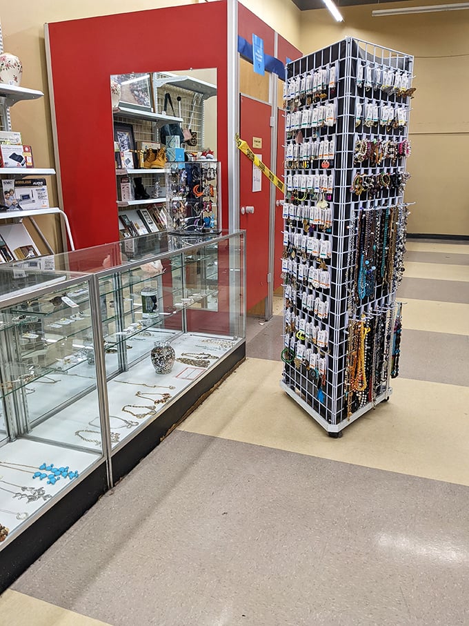 A rotating tower of necklaces stands guard by the display case&mdash;proof that statement pieces don't need statement prices.