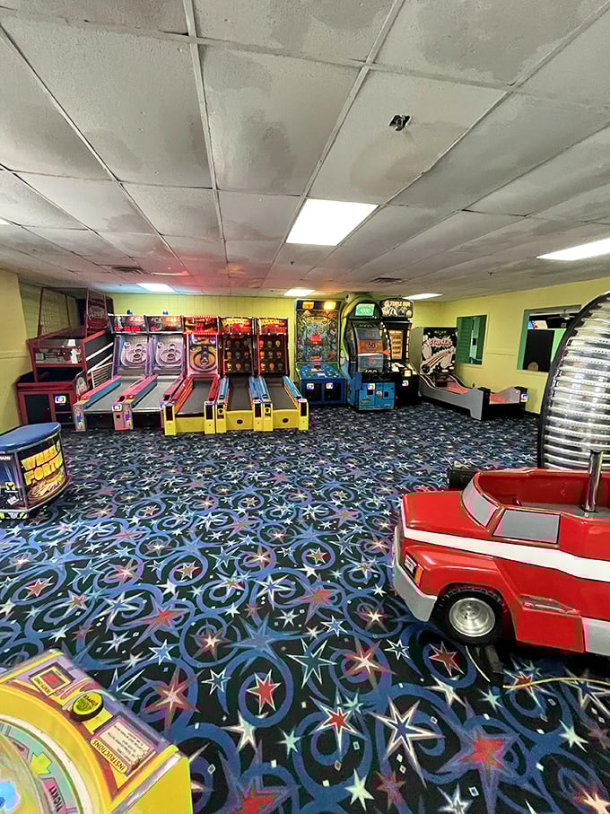 The arcade area buzzes with lights and sounds, offering a nostalgic trip for parents and new thrills for kids between bowling frames.