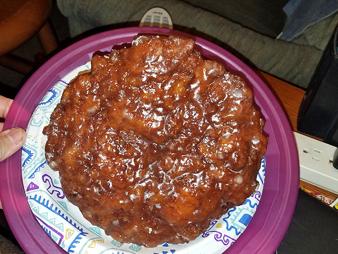 Behold the crown jewel on its royal plate. This apple fritter isn't just breakfast &ndash; it's an event worthy of your finest china.