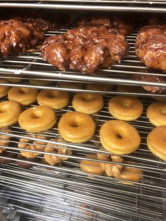 Fresh from the rack, these golden-brown fritters and glazed donuts are the reason alarm clocks were invented.