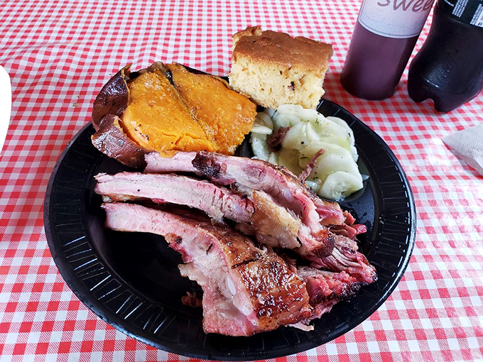 Pulled pork and cucumber salad having a picnic on your plate. The cornbread is just there to soak up the glory.
