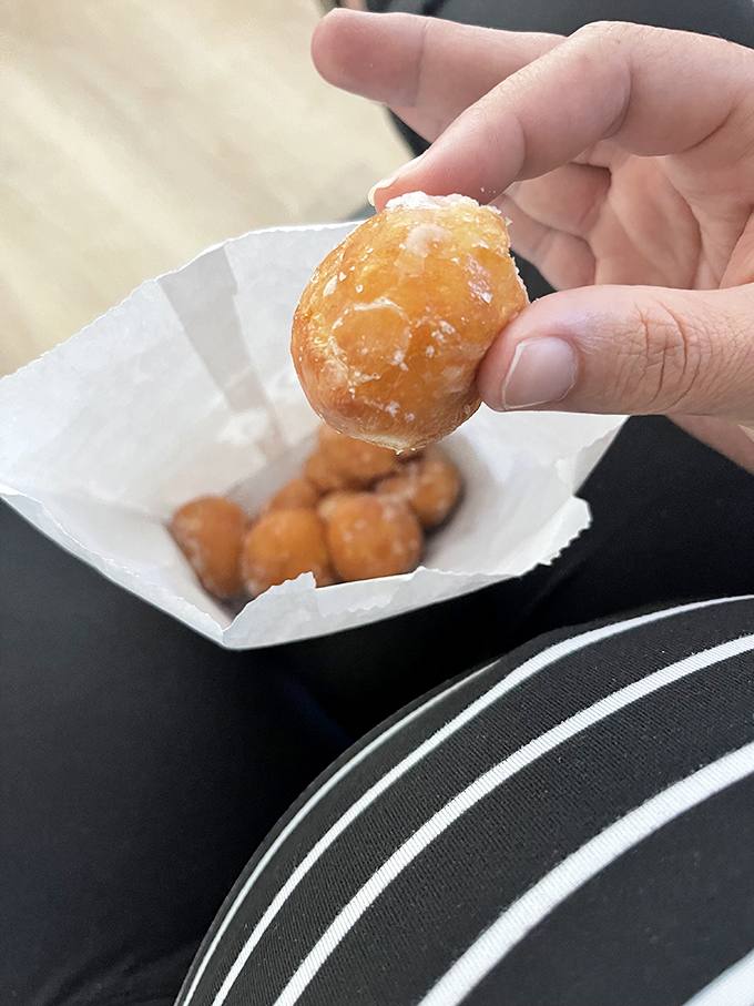 Who needs fancy china when you've got orange trays, hot coffee, and donuts that outshine any five-star dessert?