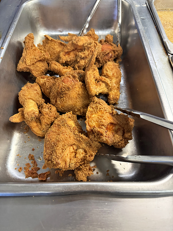 The buffet's crown jewel awaits eager tongs&mdash;each golden-battered piece promising a celestial crunch followed by juice-down-your-chin satisfaction.