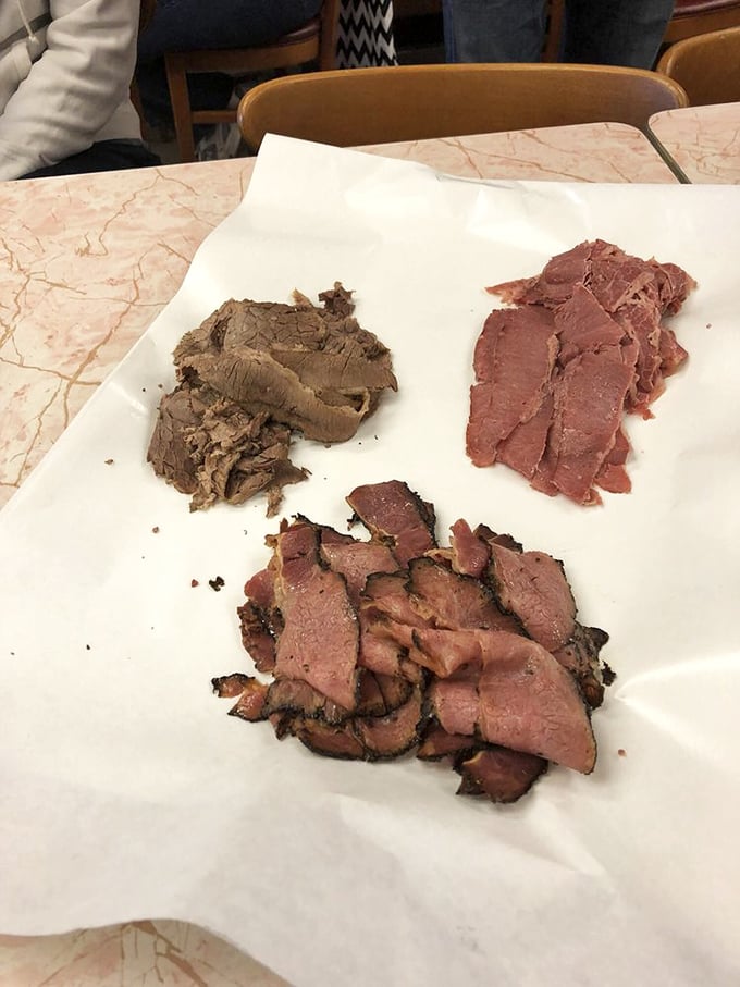 The roast beef and rye perform their daily tango of perfection. Notice how the meat is sliced so thin yet remains impossibly juicy&mdash;a delicious paradox.