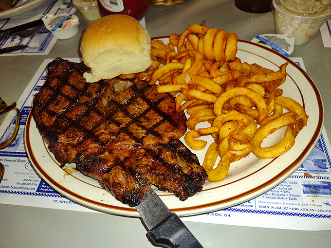Those grill marks aren't just for show&mdash;they're flavor roads leading straight to satisfaction. The onion rings are just showing off.