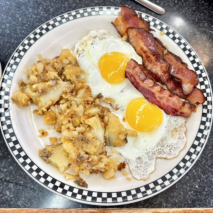 Whipped cream cascading over a golden crepe &ndash; dessert masquerading as breakfast, and nobody's complaining about this delicious deception.